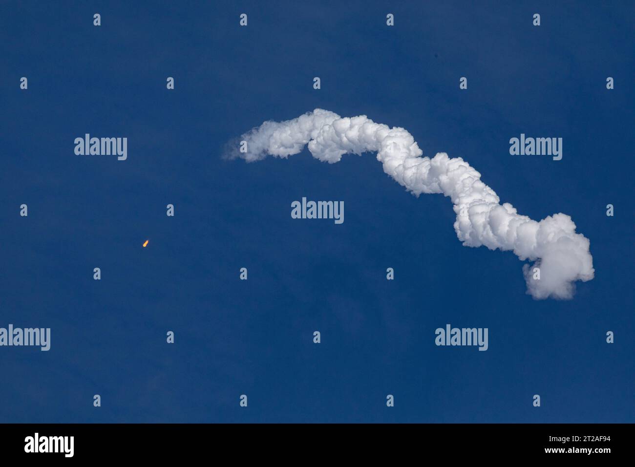NASA/SpaceX CRS-26 Liftoff. A SpaceX Falcon 9 rocket soars upward after ...