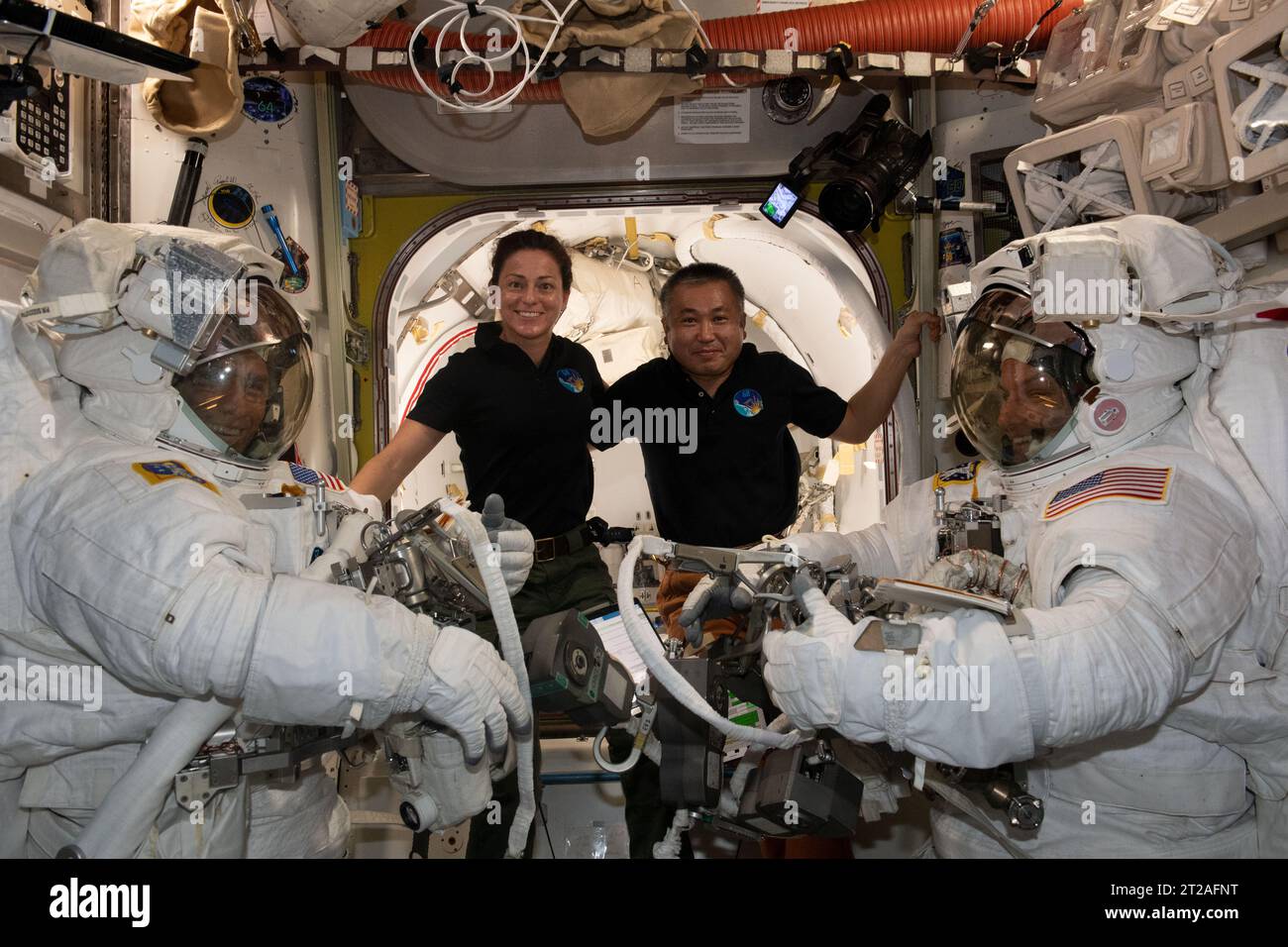 . iss068e026320 (Dec. 3, 2022) --- Flight Engineers Nicole Mann (center ...