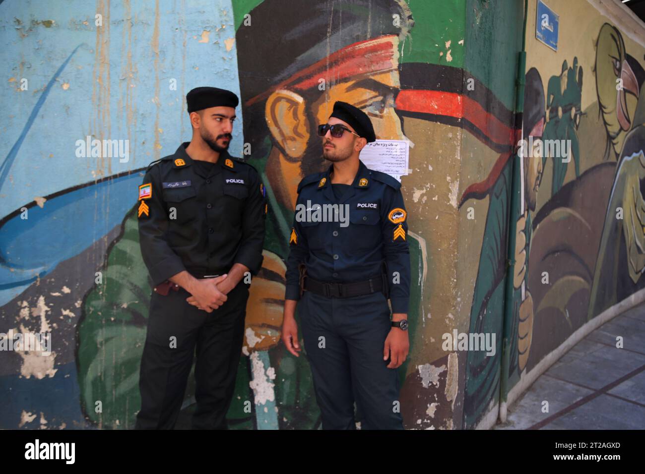 Tehran, Iran. 18th Oct, 2023. Two Iranian police officers are seen ...
