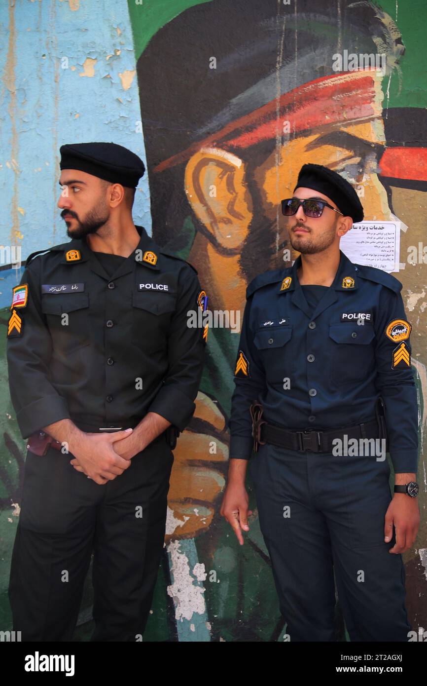 Tehran, Iran. 18th Oct, 2023. Two Iranian police officers are seen ...