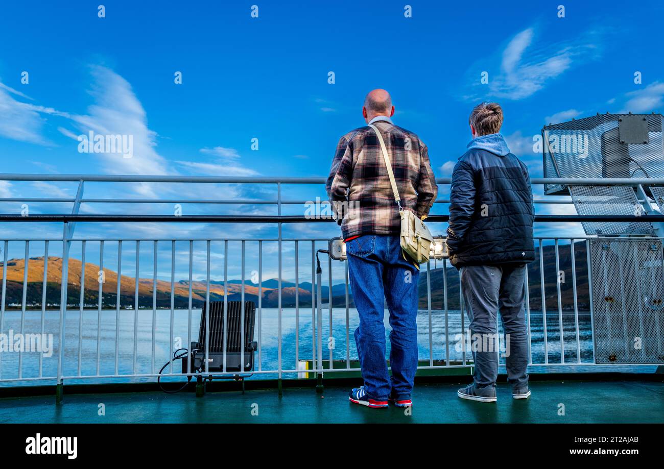 People watching as the car ferry leaves Ullapool in the Scottish ...