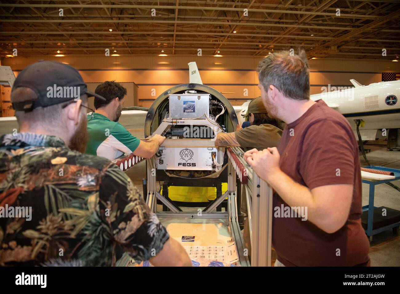 . NASA Armstrong’s ER-2 aircraft is uploaded with instruments for its ...