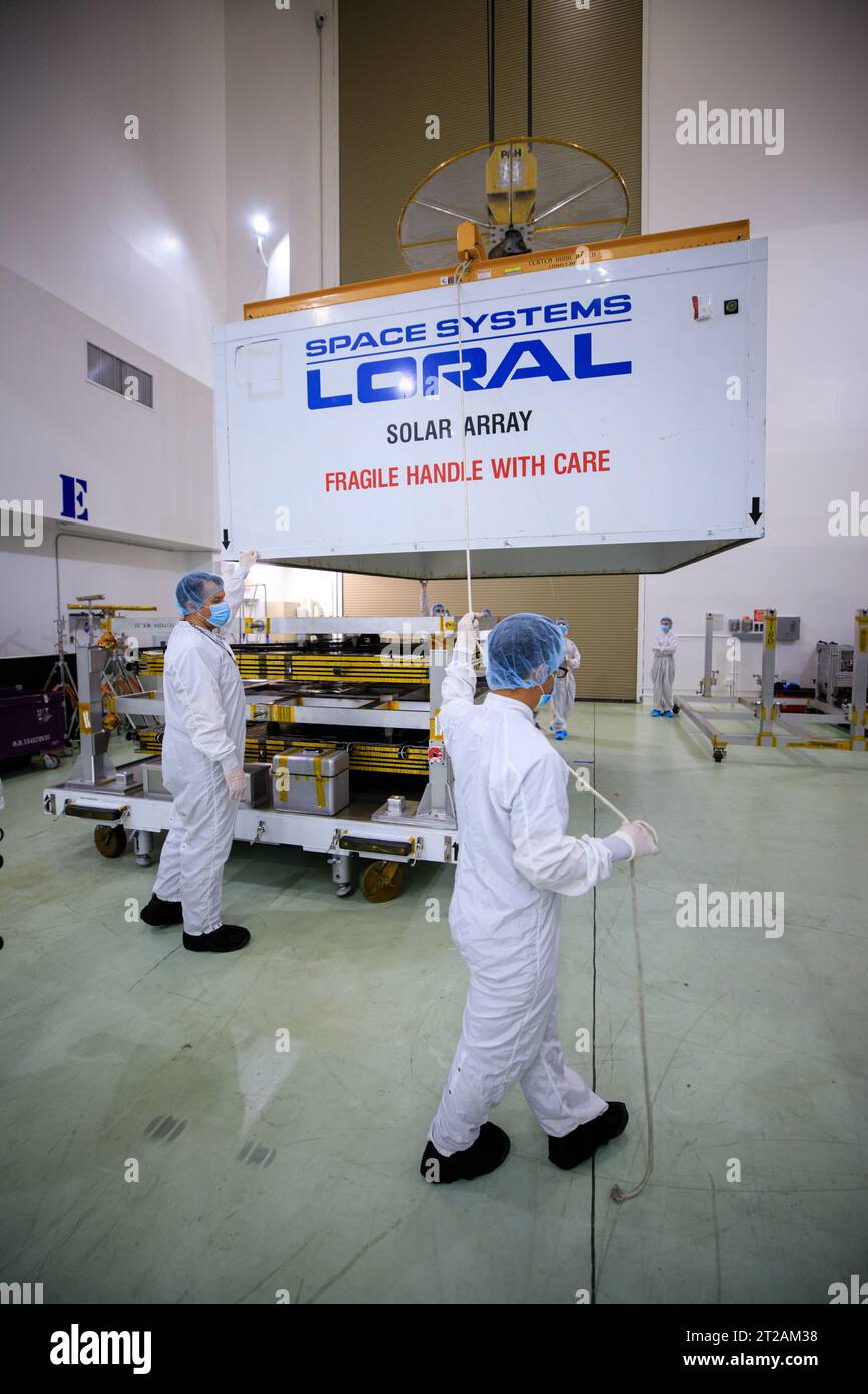 Psyche Solar Array Unboxing. A NASA team lifts the cover off the twin ...
