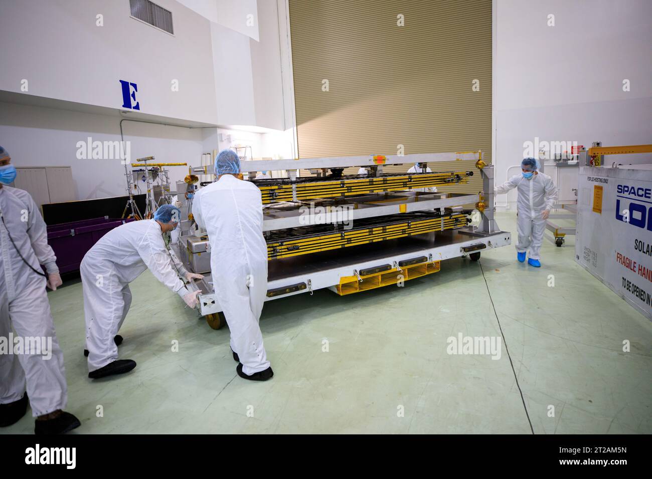 Psyche Solar Array Unboxing. A NASA team uncrates the twin solar arrays ...