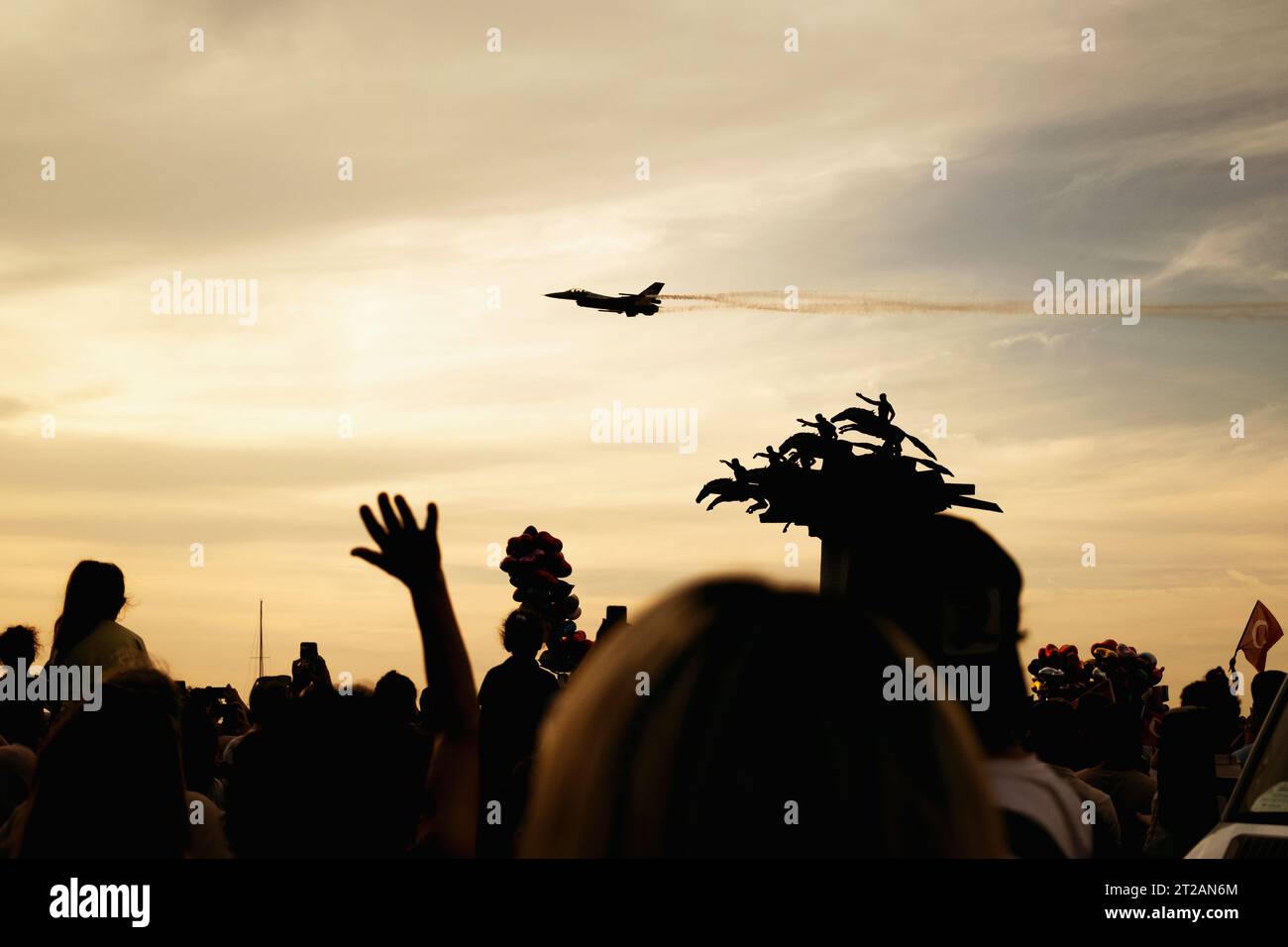 Izmir, Turkey, September 9, 2023: A sea of people, waving Turkish flags ...