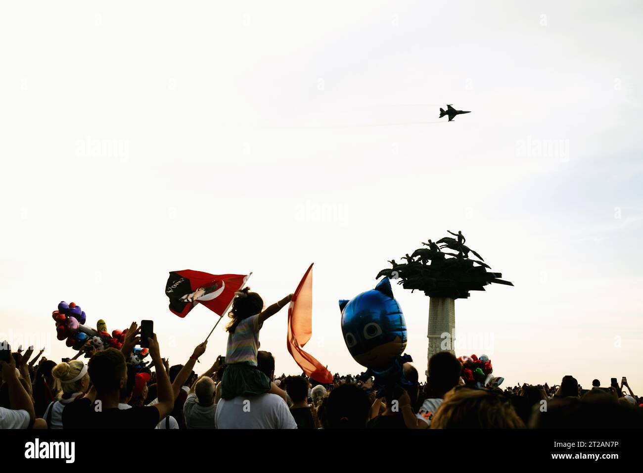 Izmir, Turkey, September 9, 2023: A sea of people, waving Turkish flags ...