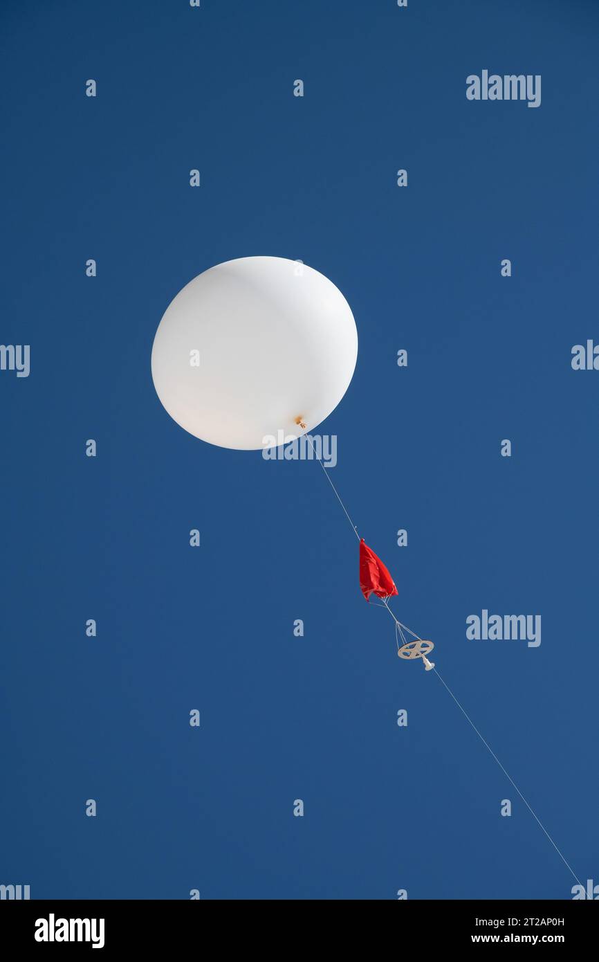 . A weather balloon is launched to collect wind data for the Advanced ...