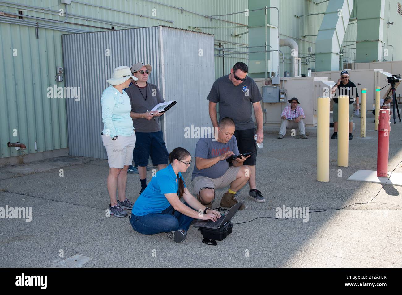 . Tyler Willhite, sitting, and Derek Abramson and Justin Link, prepare ...