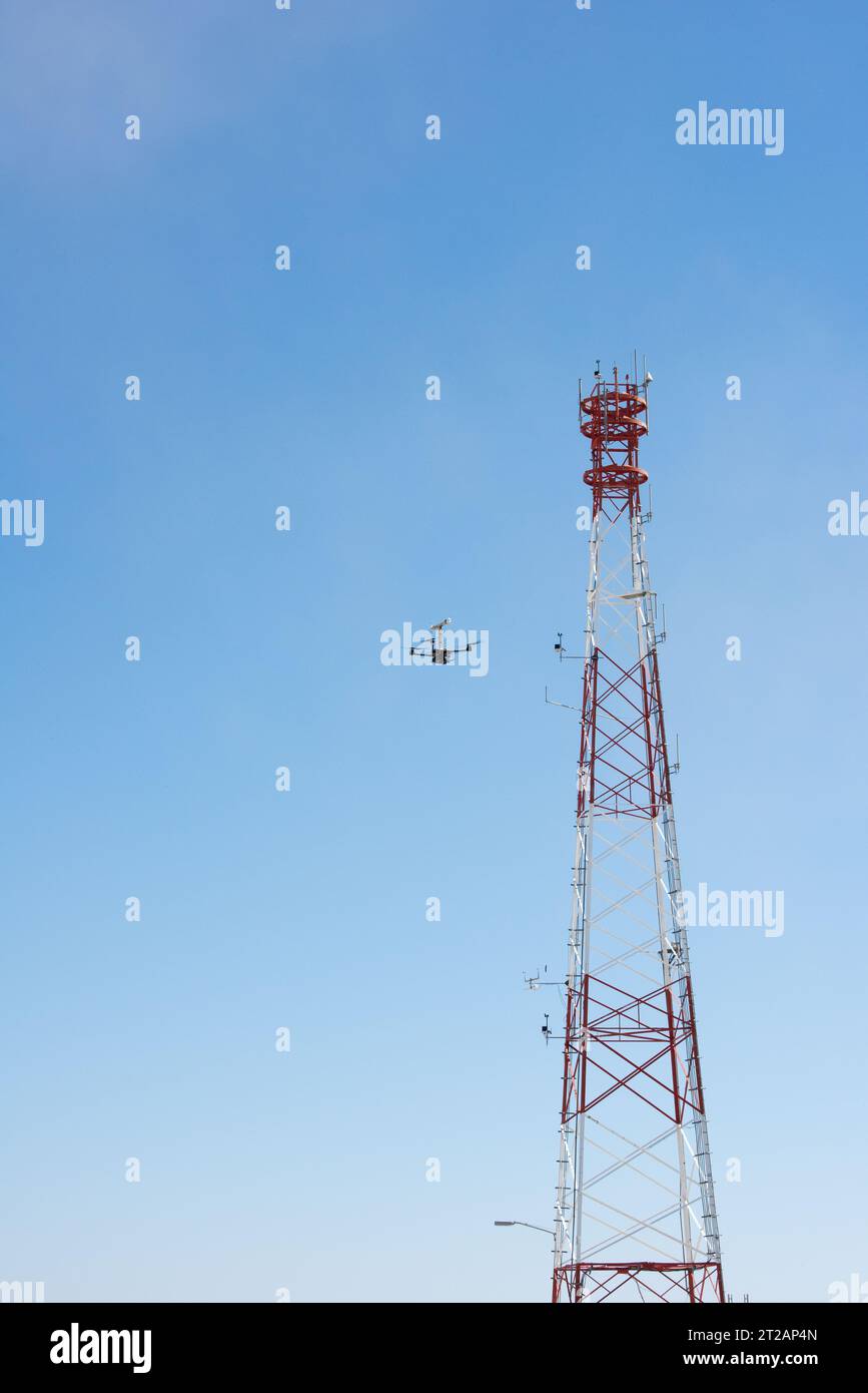 . The Alta-X aircraft flies by a 140-foot instrumented tower at NASA’s ...