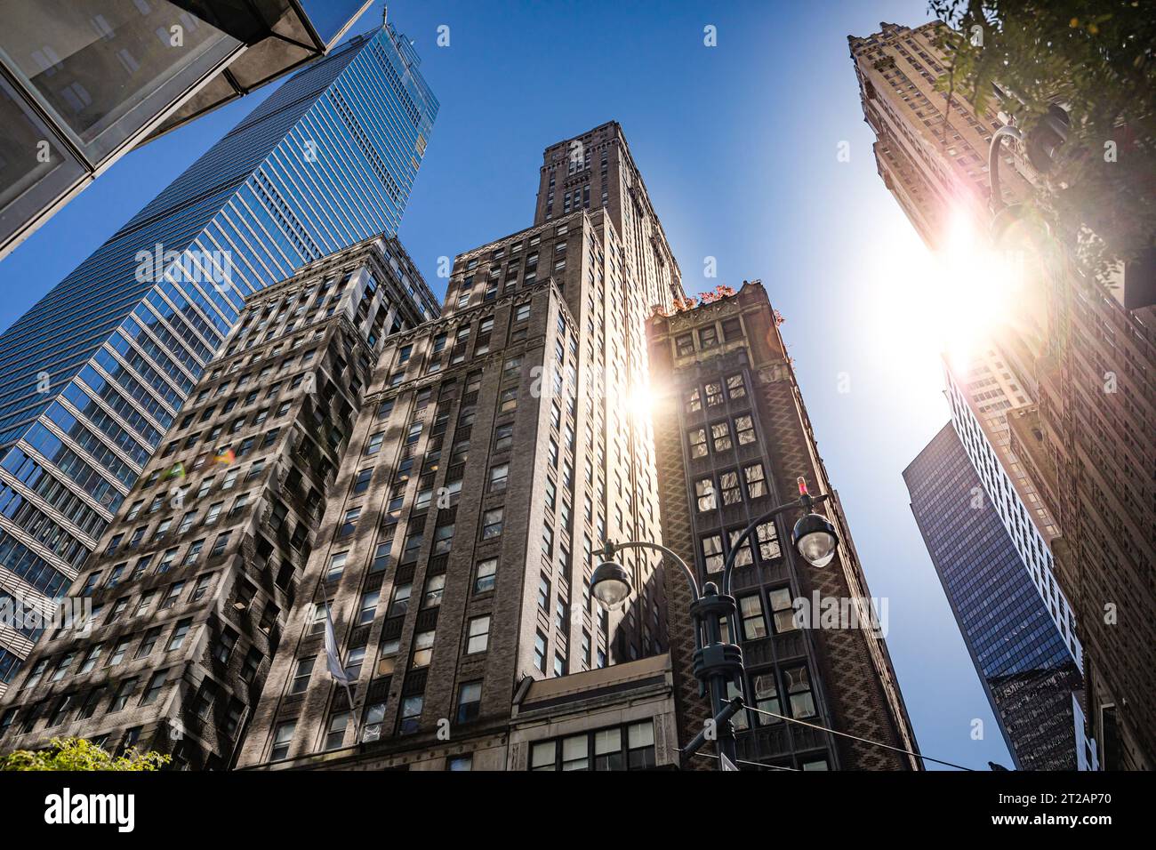 Modern glass and classic tall office buildings in New York. A ...