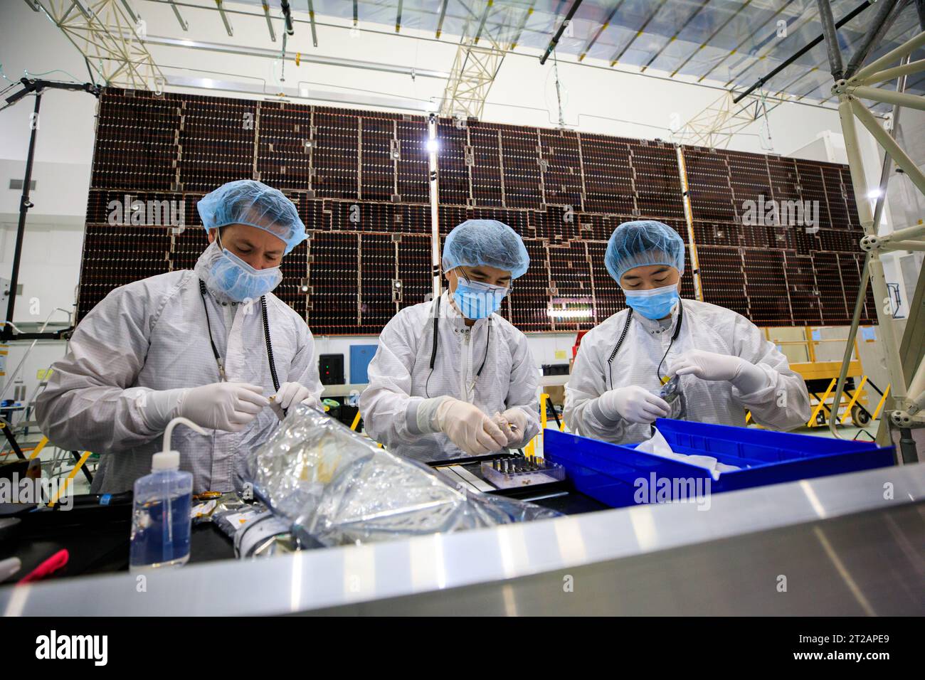 NASA's Psyche Solar Array Integration and Walkout. Team members prepare ...