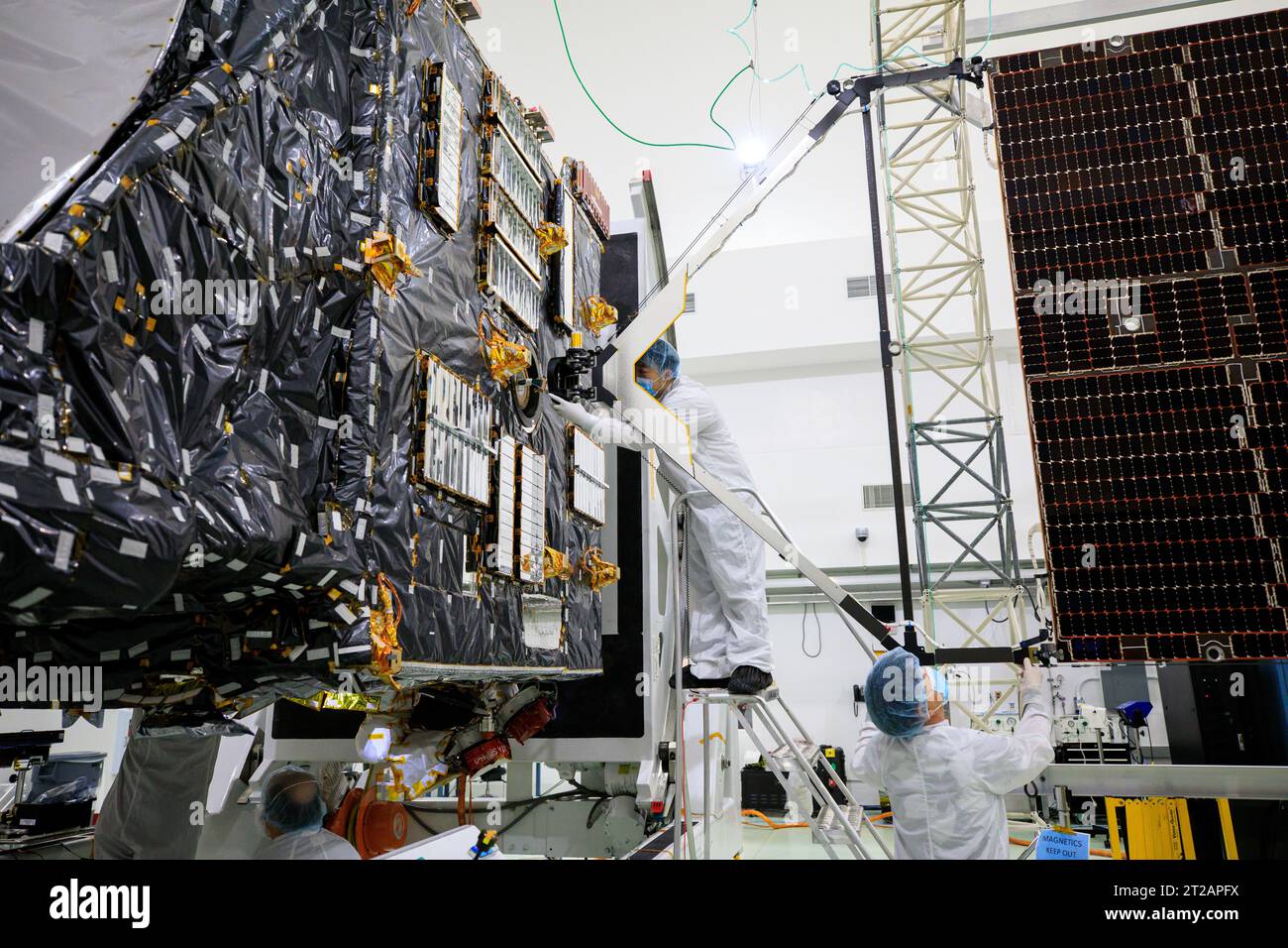 NASA's Psyche Solar Array Integration and Walkout. Team members prepare ...