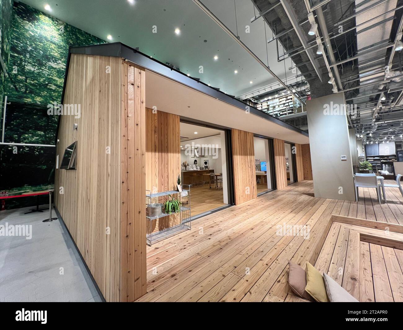 Tokyo May 3 2023: the exterior of Muji store and wooden house demo in ...