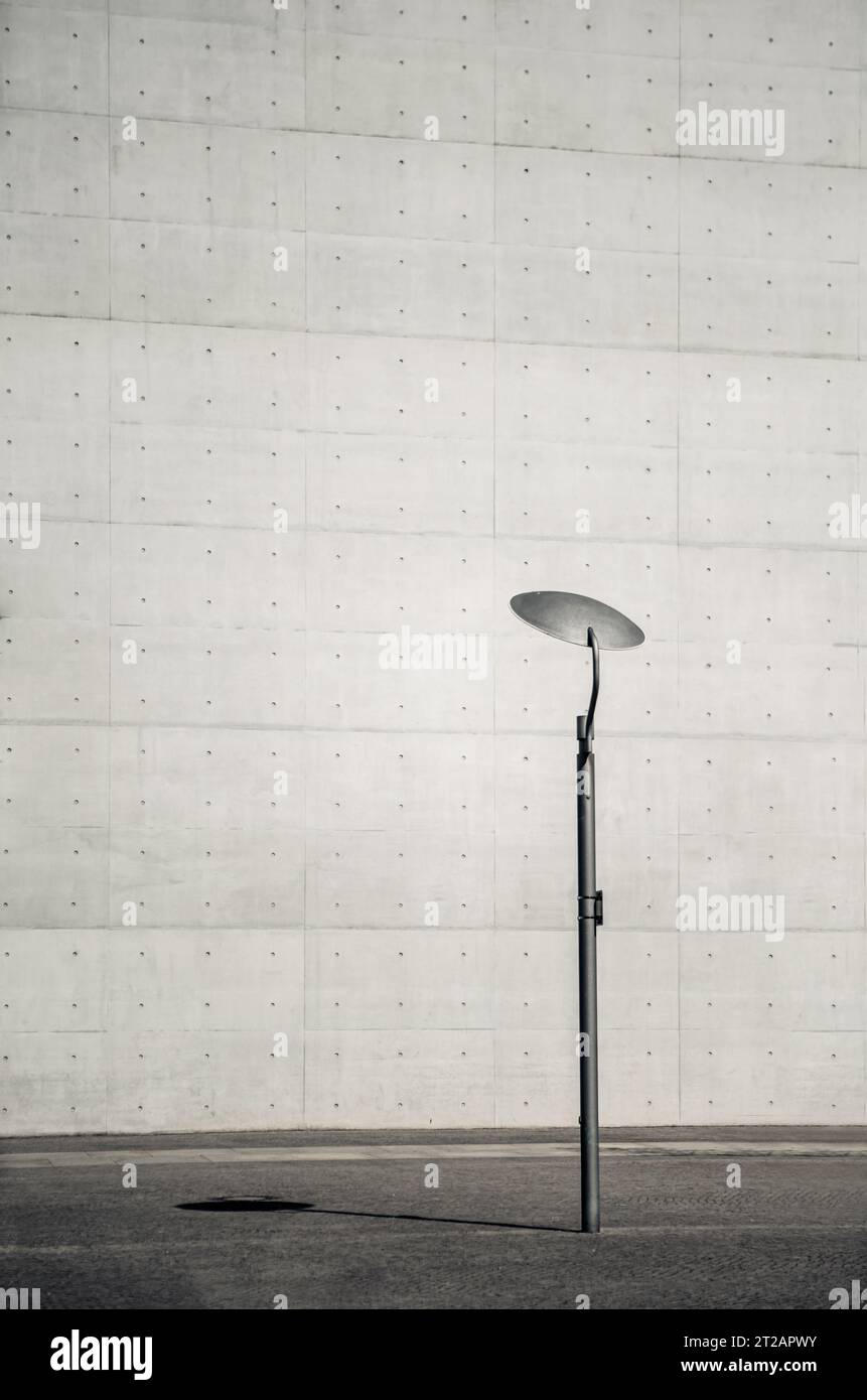 Minimalistic architecture. Street lamp cast shadow against grunge ...