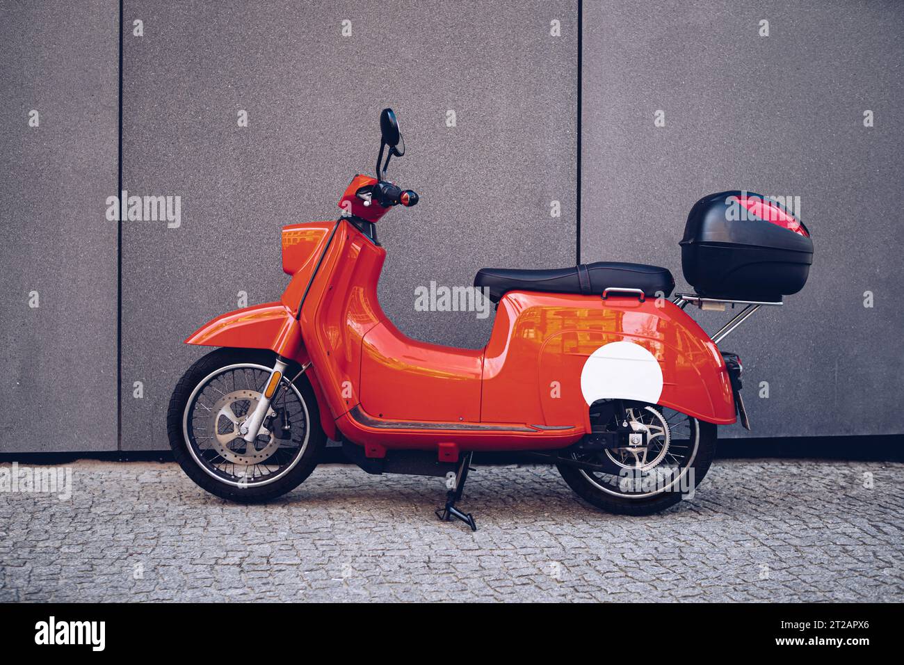 Red retro scooter. Vintage motorbike pared in the city street Stock ...