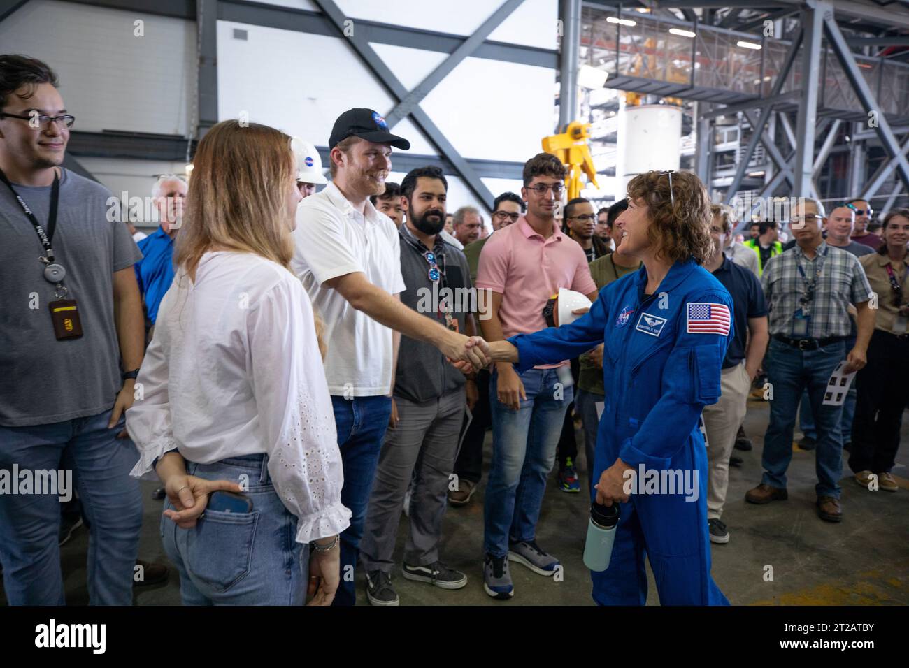 Artemis II Crew with EGS. Artemis II NASA astronaut Christina Koch greets Exploration Ground ...