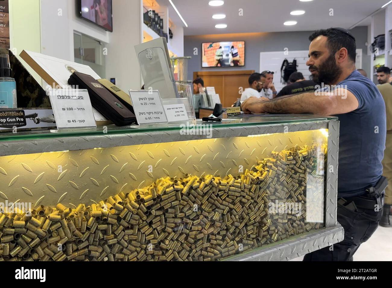 Israeli civilians attend the shop of Caliber 3 training facility, which ...