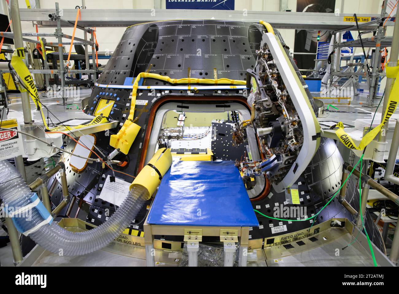 Artemis II Crew with EGS. Shown inside the high bay of the Neil A ...