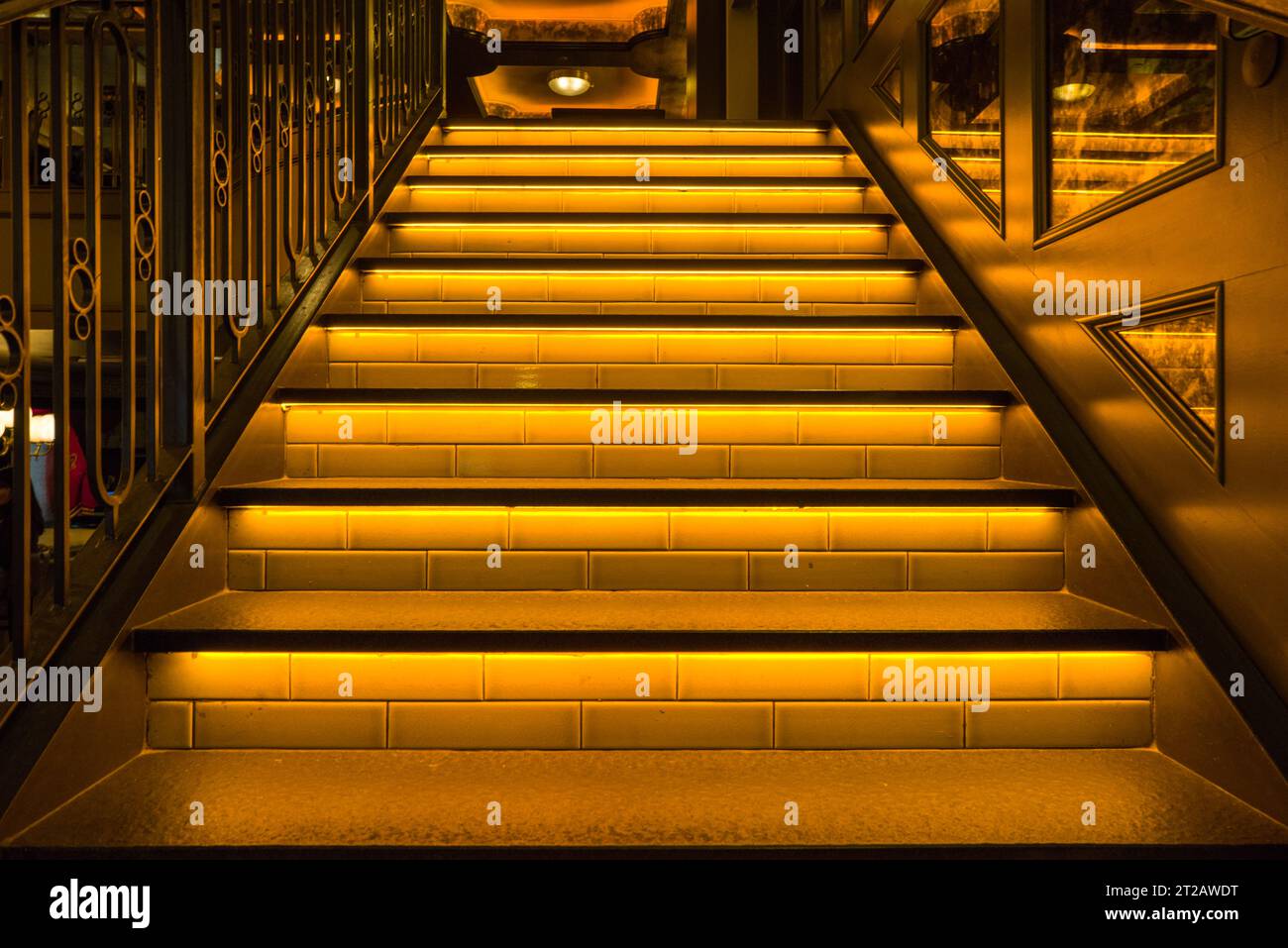 Low angle view of empty indoor illuminated stair steps Stock Photo - Alamy
