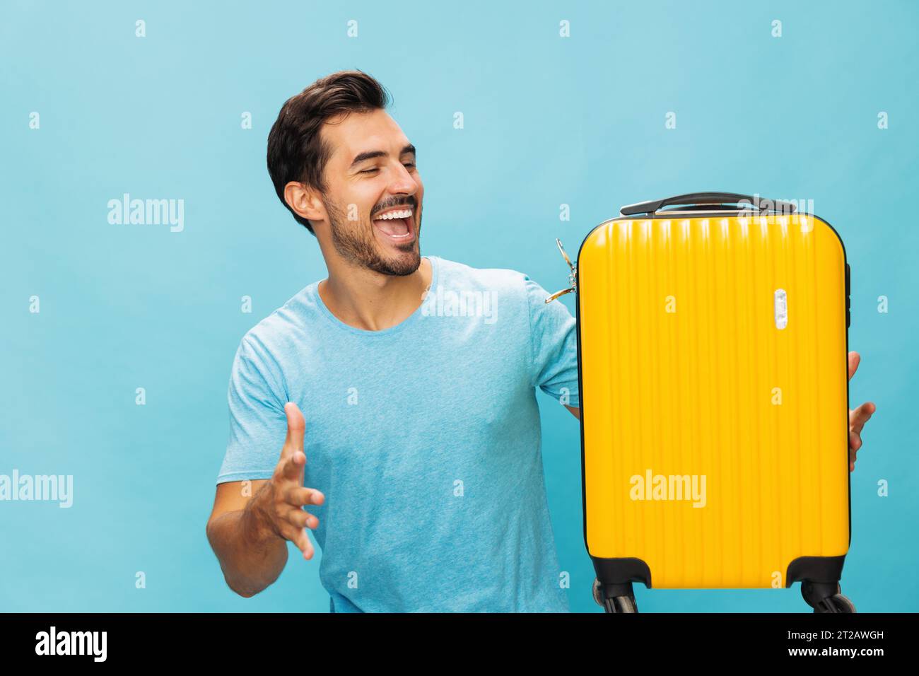 Suitcase man travel traveler background yellow journey baggage vacation ...