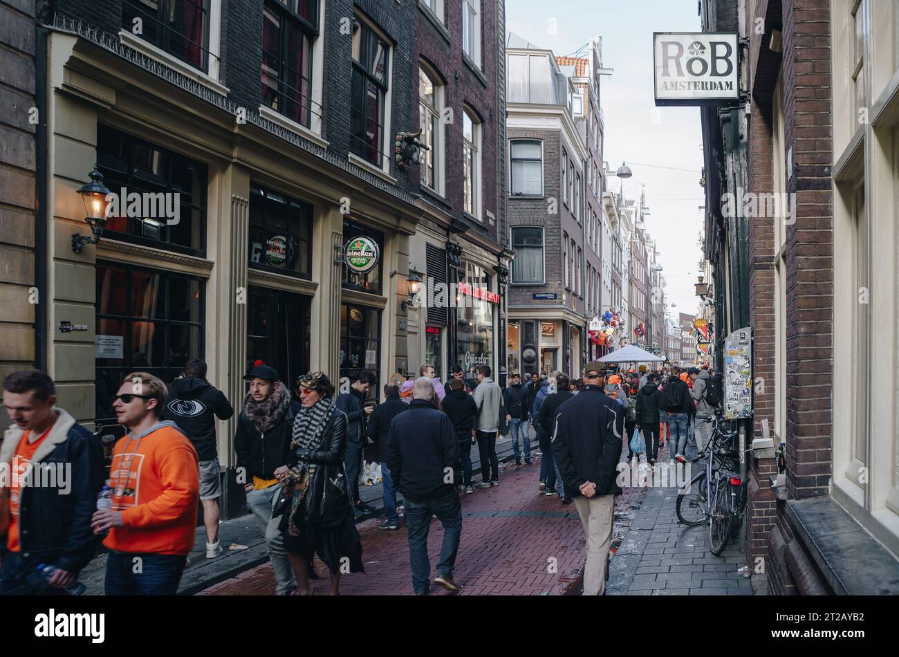 King's Day (Dutch: Koningsdag) celebration in Red Light District ...
