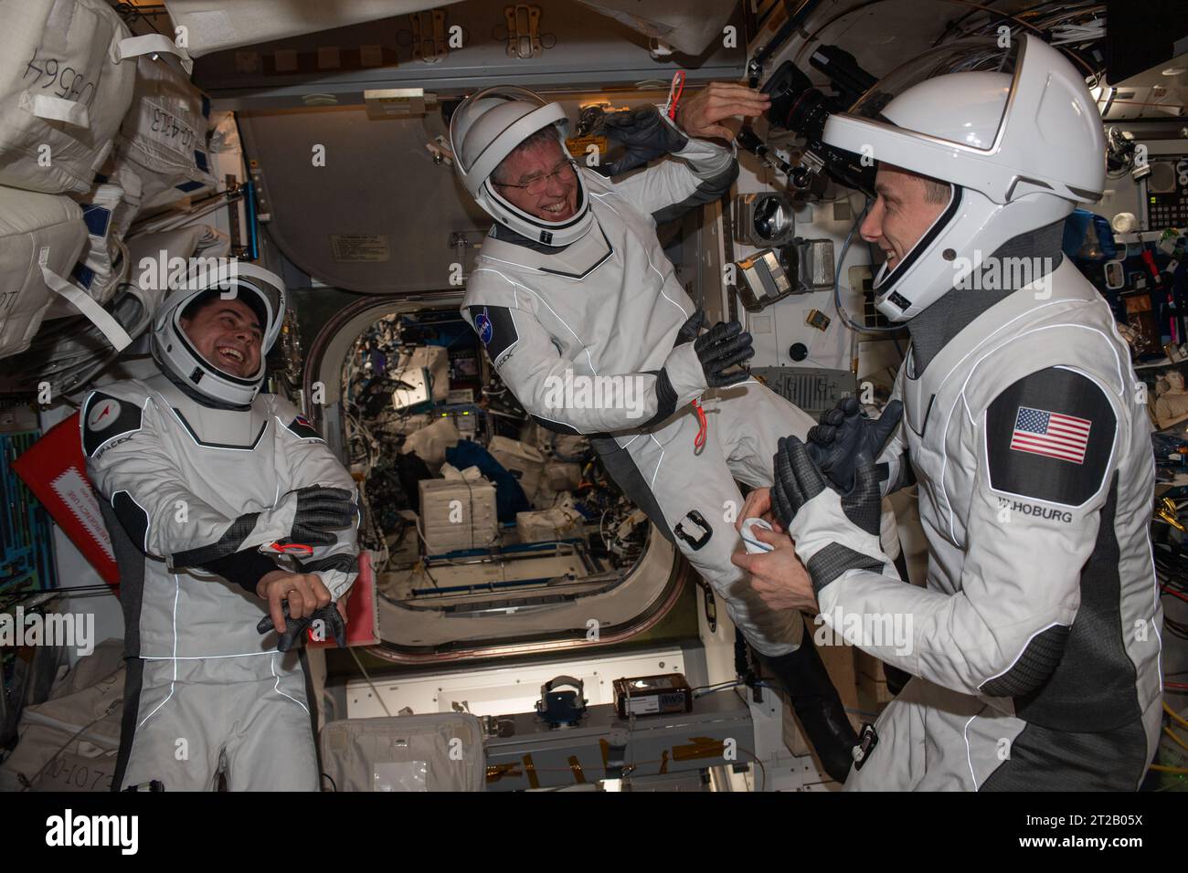 . iss069e082304 (Aug. 23, 2023) --- Expedition 69 Flight Engineers (from left) Andrey Fedyaev of ...