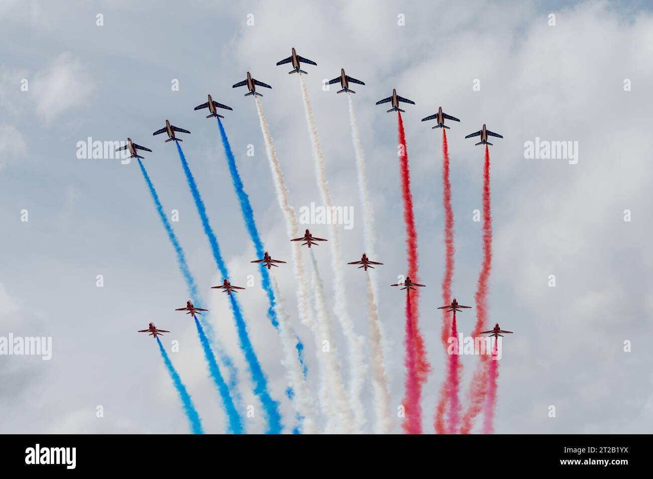 The Patrouille Acrobatique de France and the Red Arrows create the ...