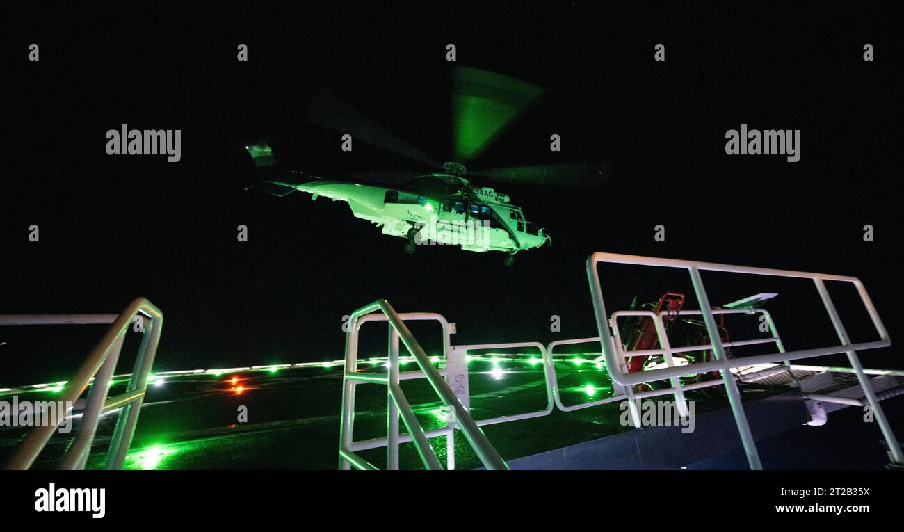 The helicopter carrying NASA astronauts Stephen Bowen and Warren Hoburg ...
