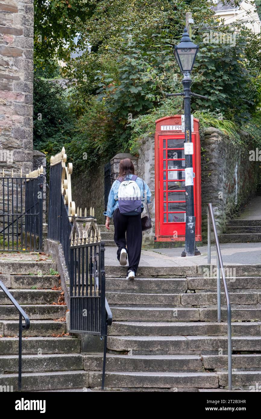 Woman walking up steps hi-res stock photography and images - Alamy