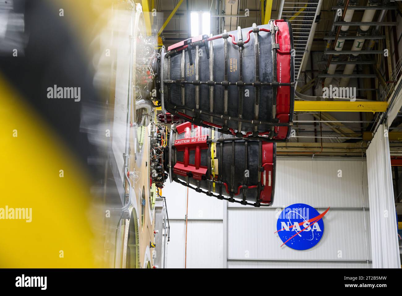 . These photos show how technicians at NASA’s Michoud Assembly Facility ...