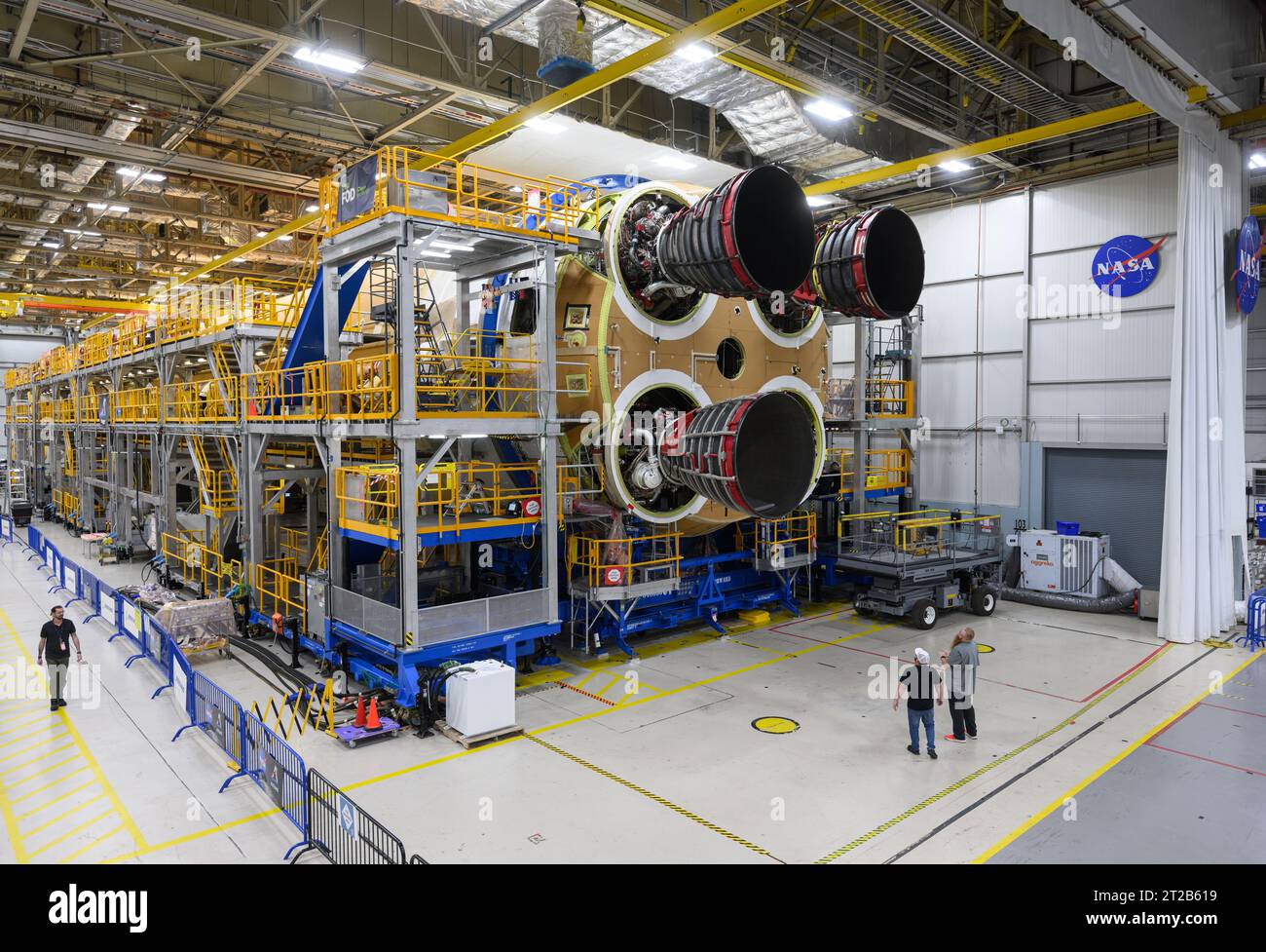 . These photos show how technicians at NASA’s Michoud Assembly Facility ...