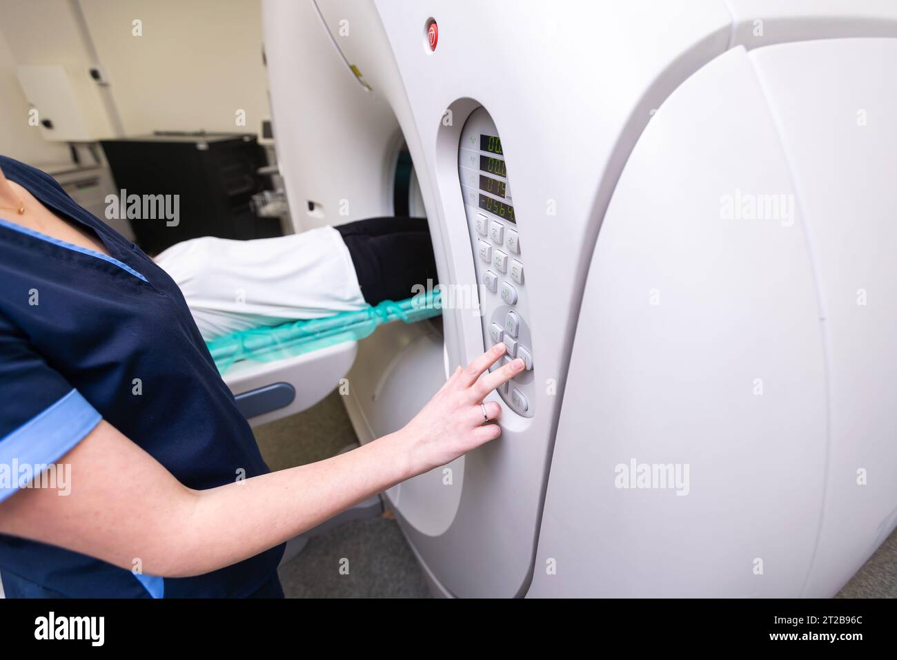 hand of doctor operating Computed Tomography device Stock Photo - Alamy