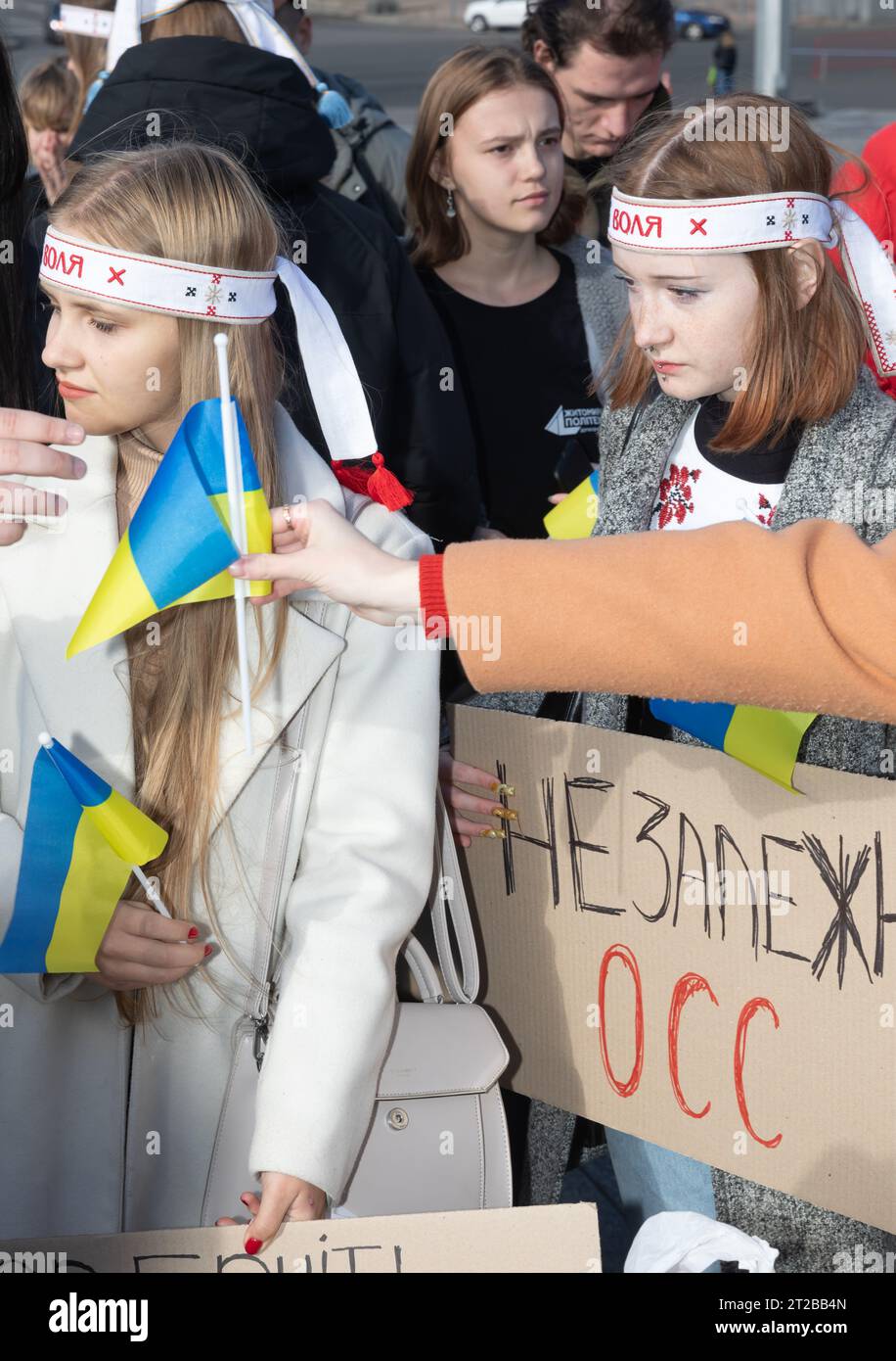 A group of students are seen wearing headbands with the word Volya ...