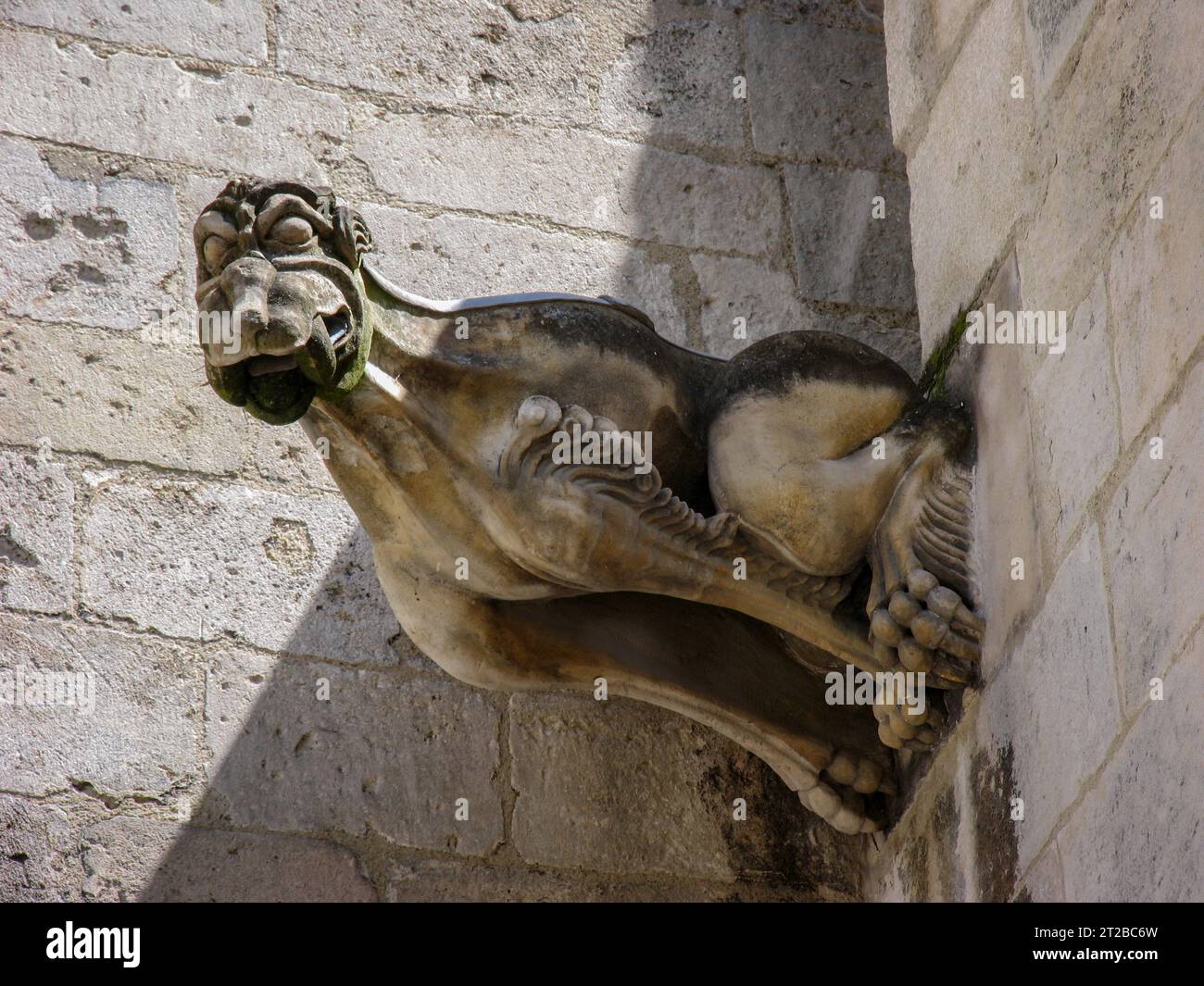 Gargoyle on the exterior of the Church of Saint Honoratus in Les ...