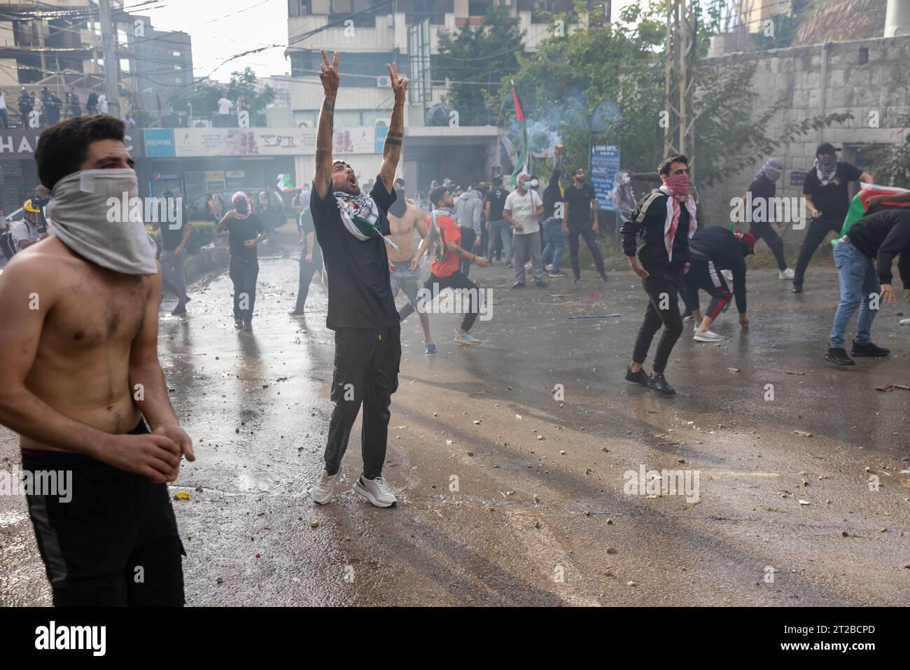 Awkar, Lebanon. 18th Oct, 2023. A demonstrator shouts while making 'V ...