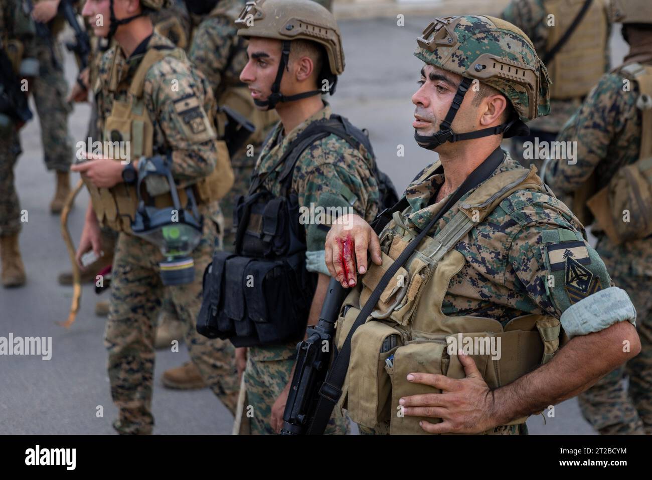 Awkar, Lebanon. 18th Oct, 2023. A injured Lebanese Army soldier bleeds ...