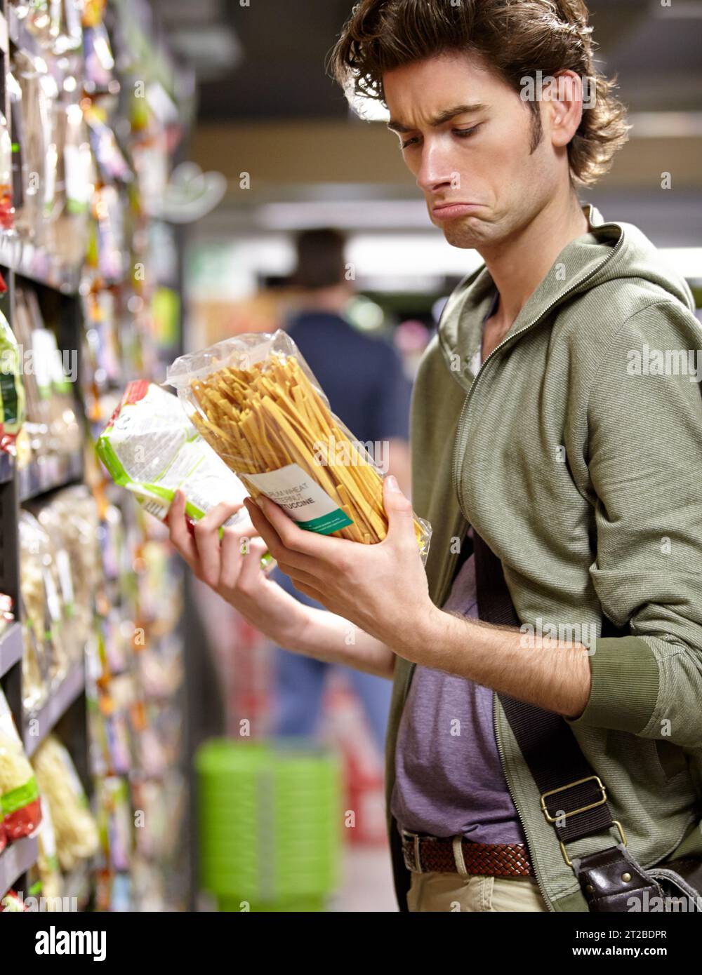 Man, product and comparison choice in supermarket for label difference ...