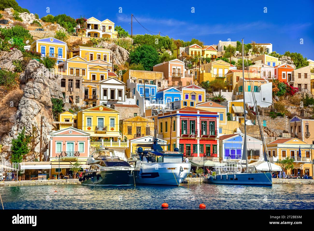 Colorful houses village in Symi island, Dodecanese islands, Greece ...