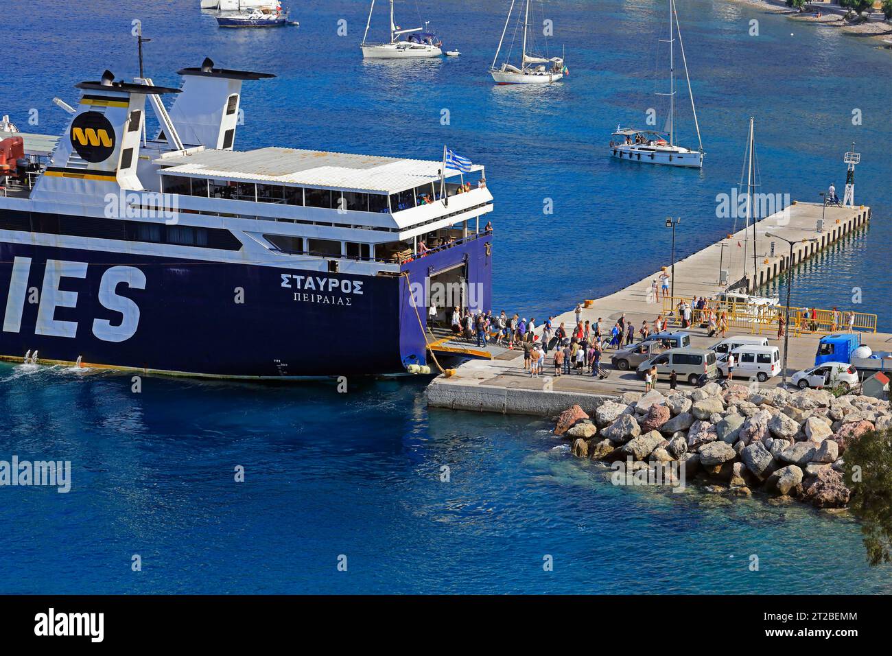The Stavros ferry boat embarking and disembarking passengers and cargo ...