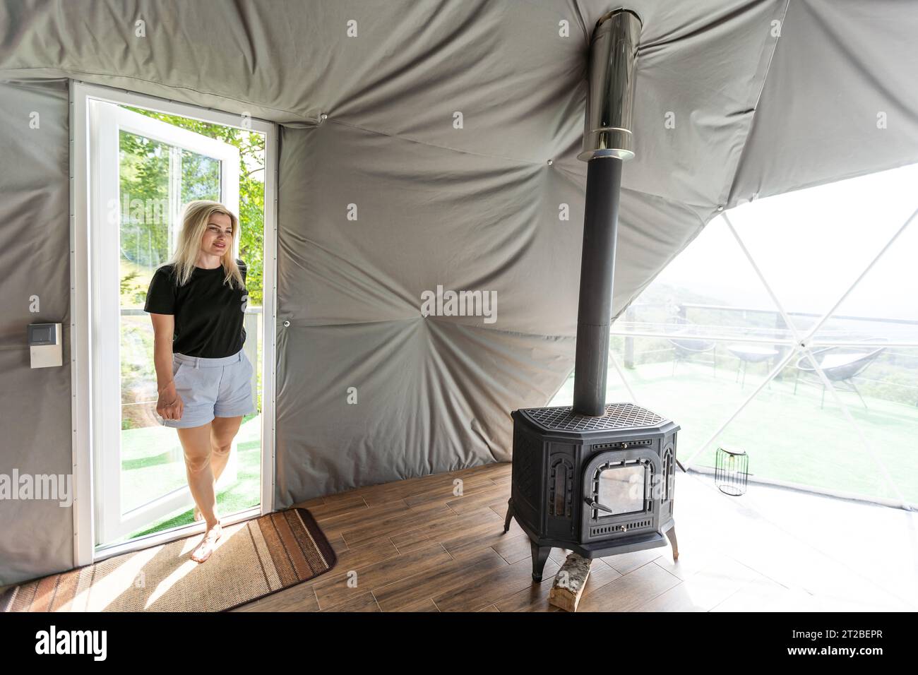 woman in dome tent. Glamping vacation lifestyle concept Stock Photo - Alamy