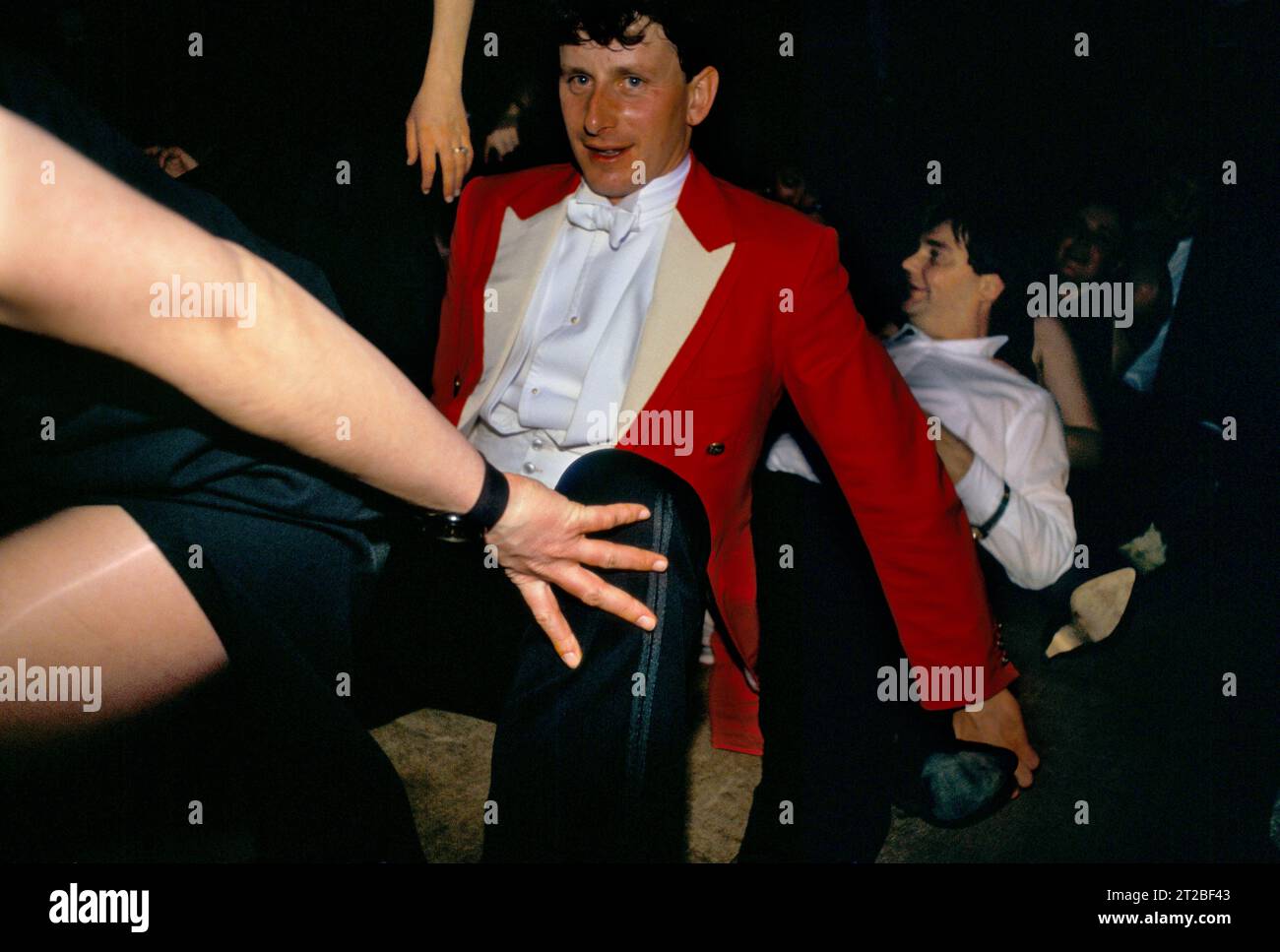 Drunk couple man falling over dancing. Hunt Ball at Tysoe Manor, Tysoe ...