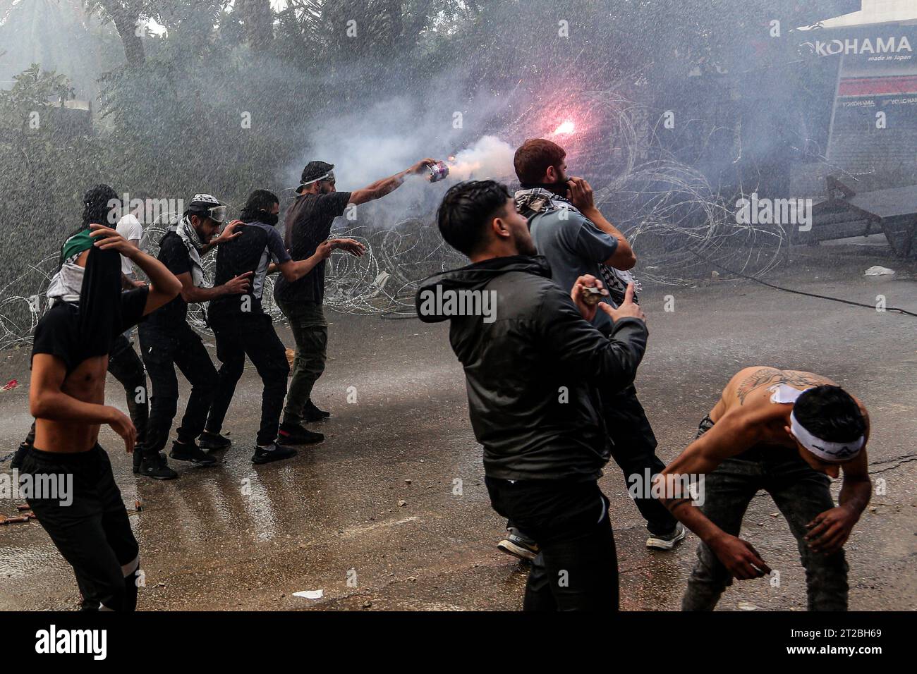 Beit Awkar, Lebanon. 18th Oct, 2023. Palestinian protestors attack ...