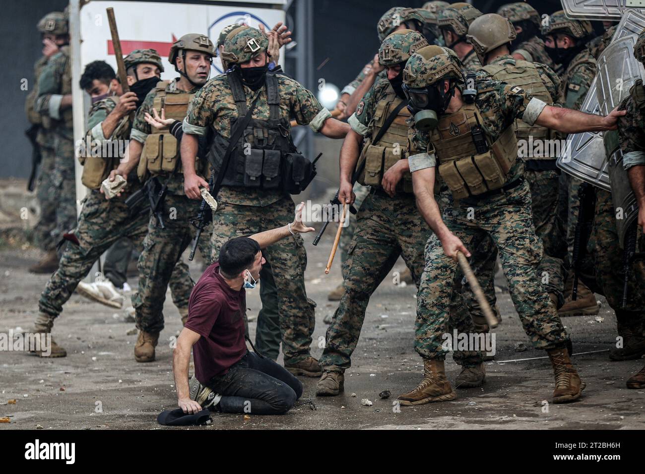 Beit Awkar, Lebanon. 18th Oct, 2023. Lebanese army soldiers beat up ...