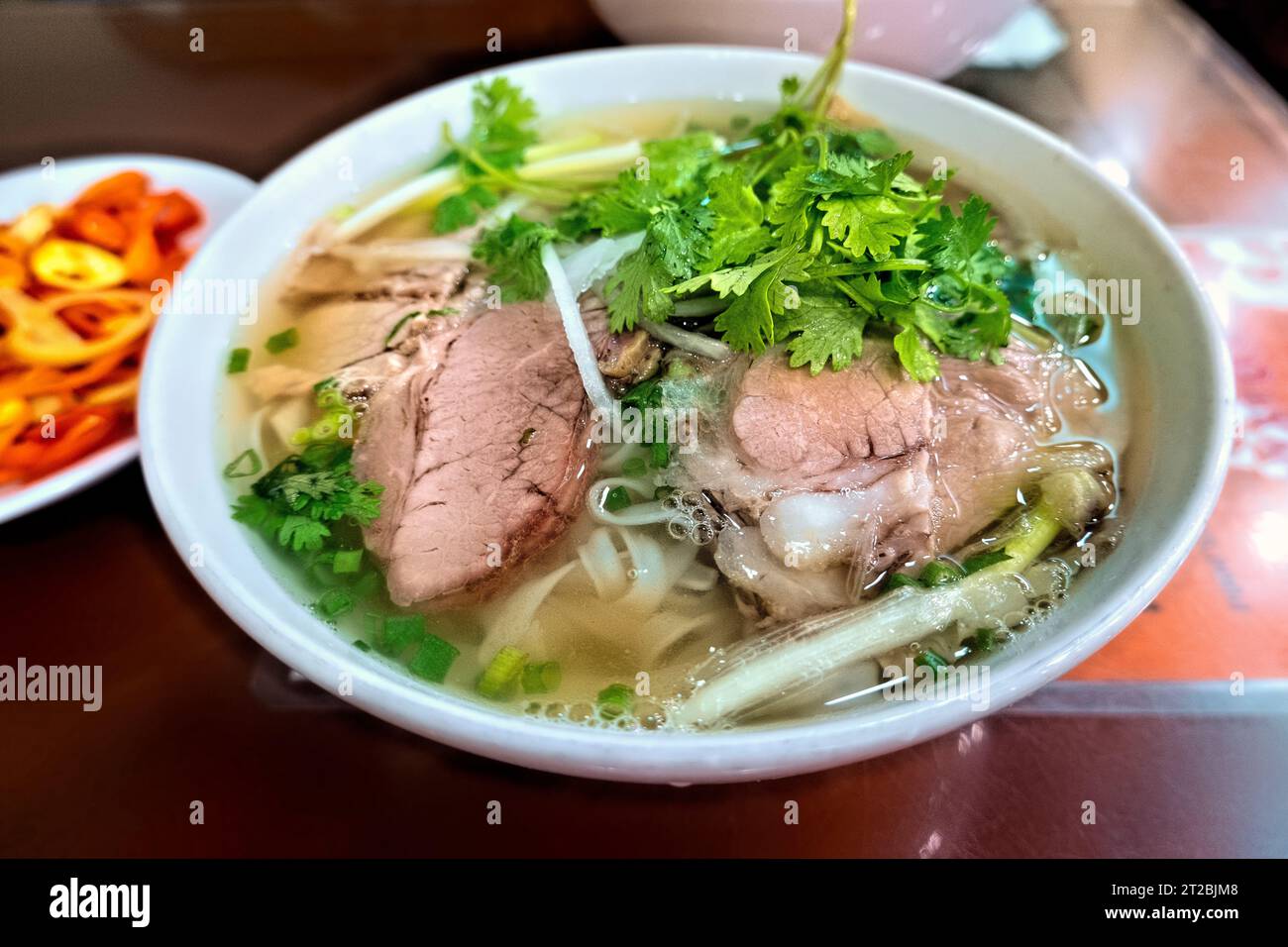 Fresh bowl of beef pho at the famed Pho 10 Ly Quoc Su restaurant, Hanoi ...