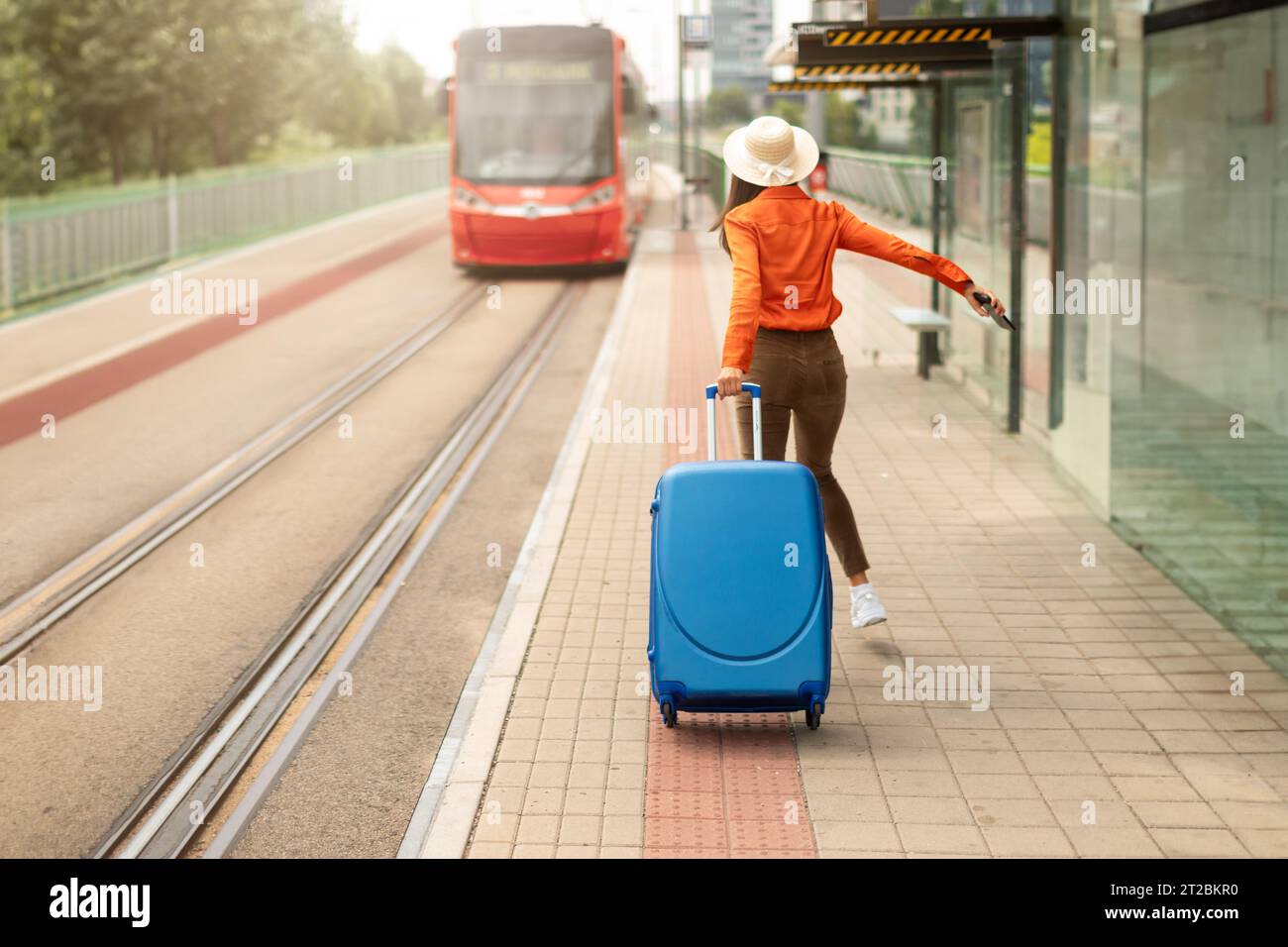 Running to catch bus hi-res stock photography and images - Alamy