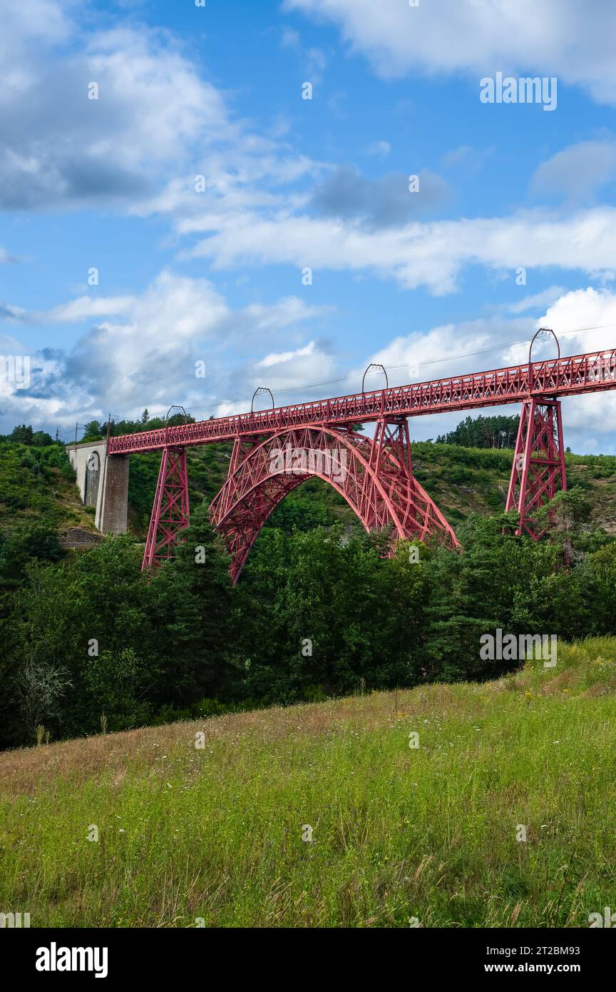 Garabit Viaduct, a red railway arch bridge constructed by Gustave ...