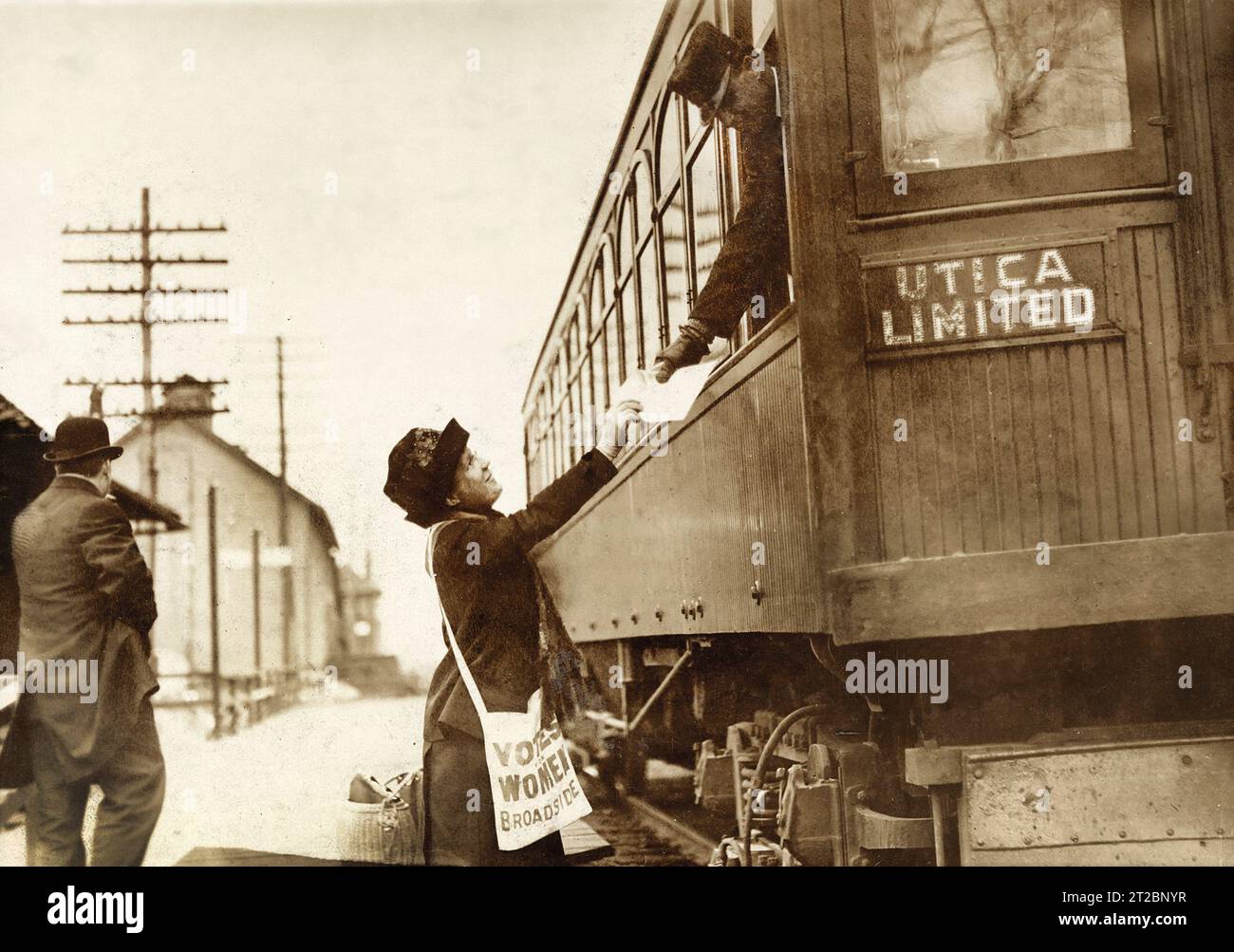 Emily Pierson, member of National Woman's Party, handing out leaflets ...