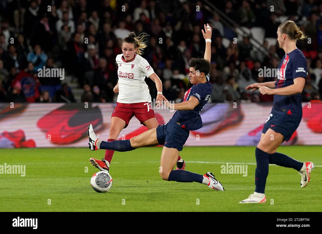 Manchester United's Ella Toone (left) has a shot on goal during the ...