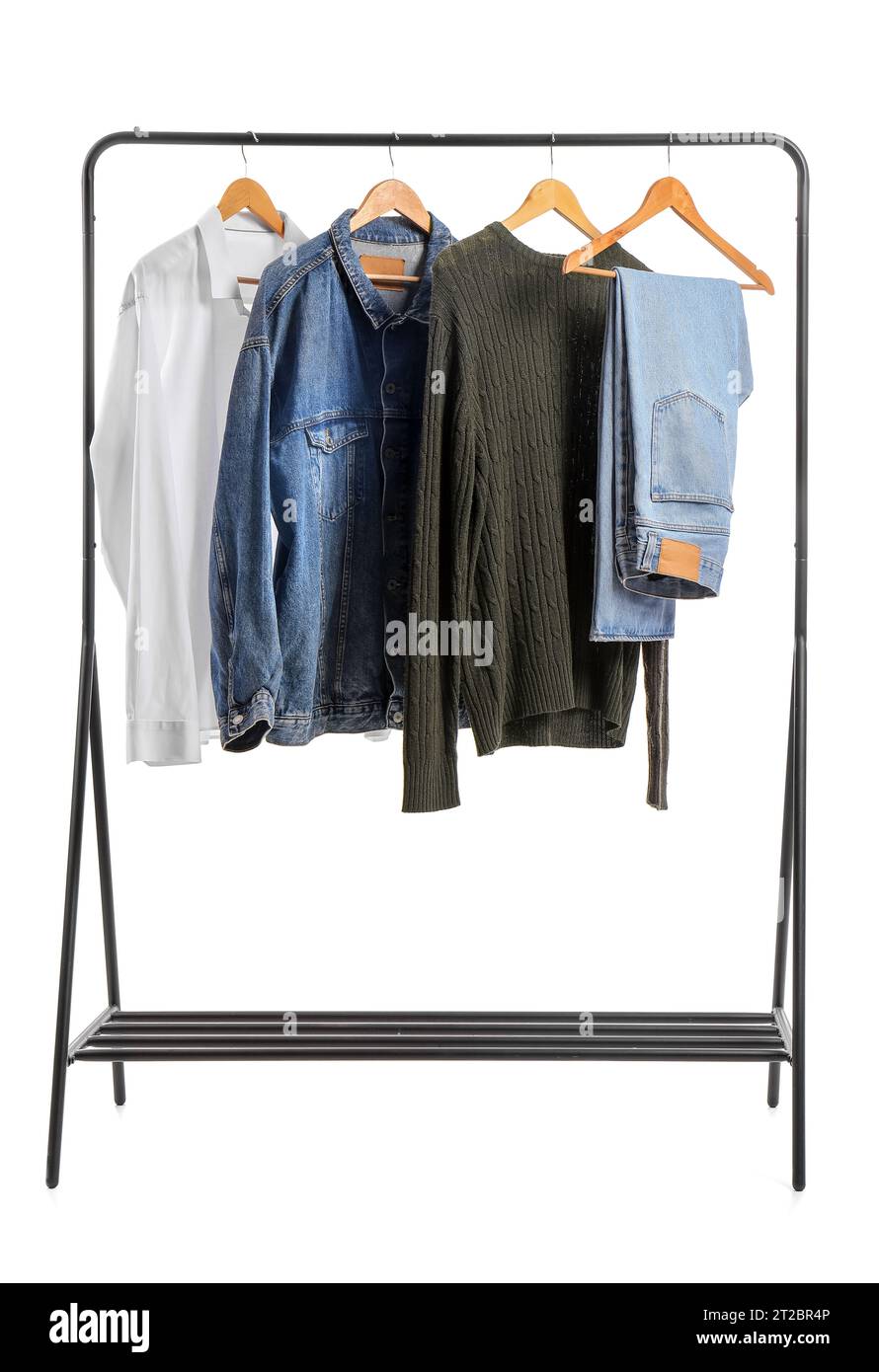 Stylish male clothes hanging on rack against white background Stock ...