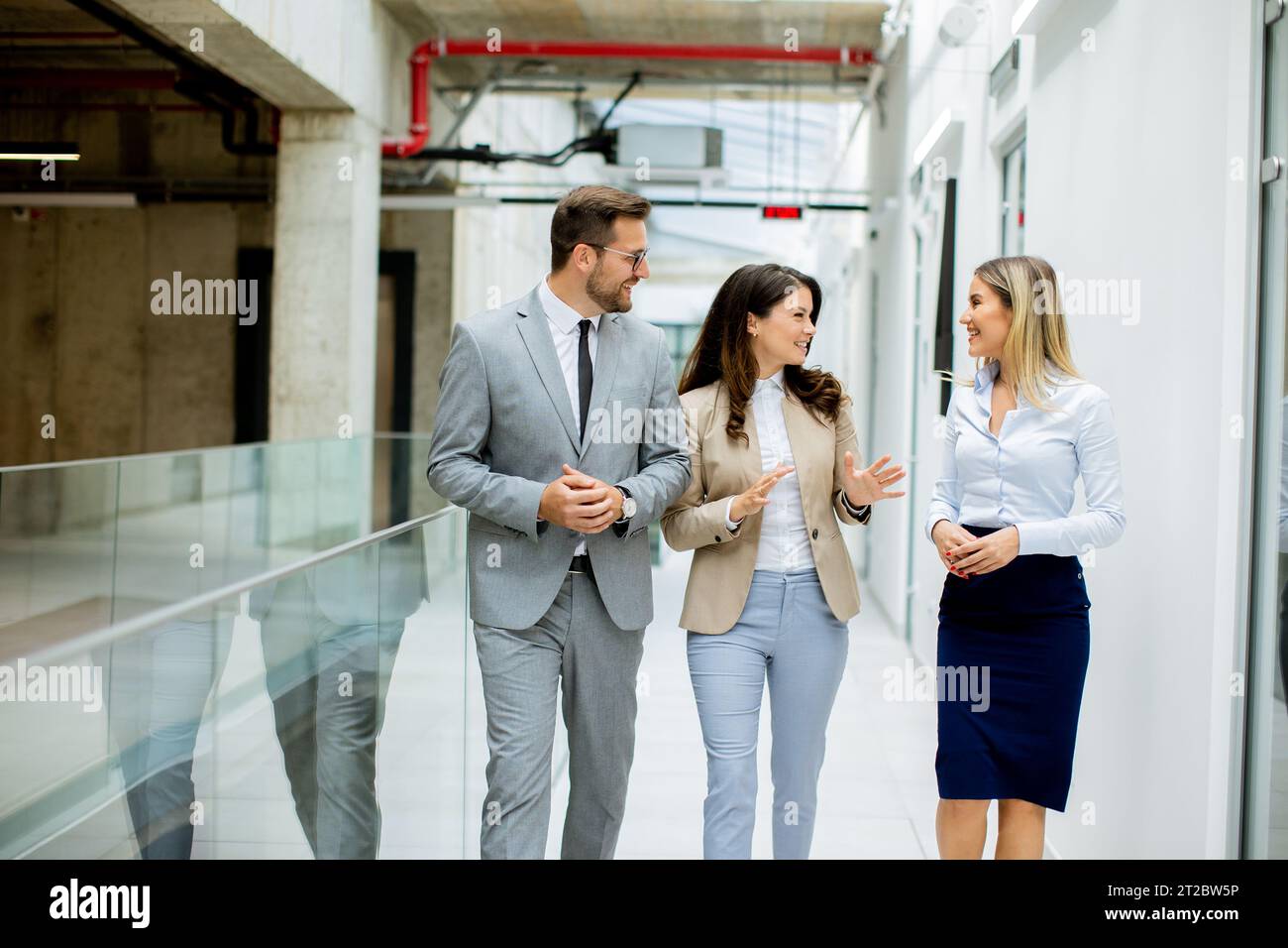 Female coworker walking in hi-res stock photography and images - Alamy